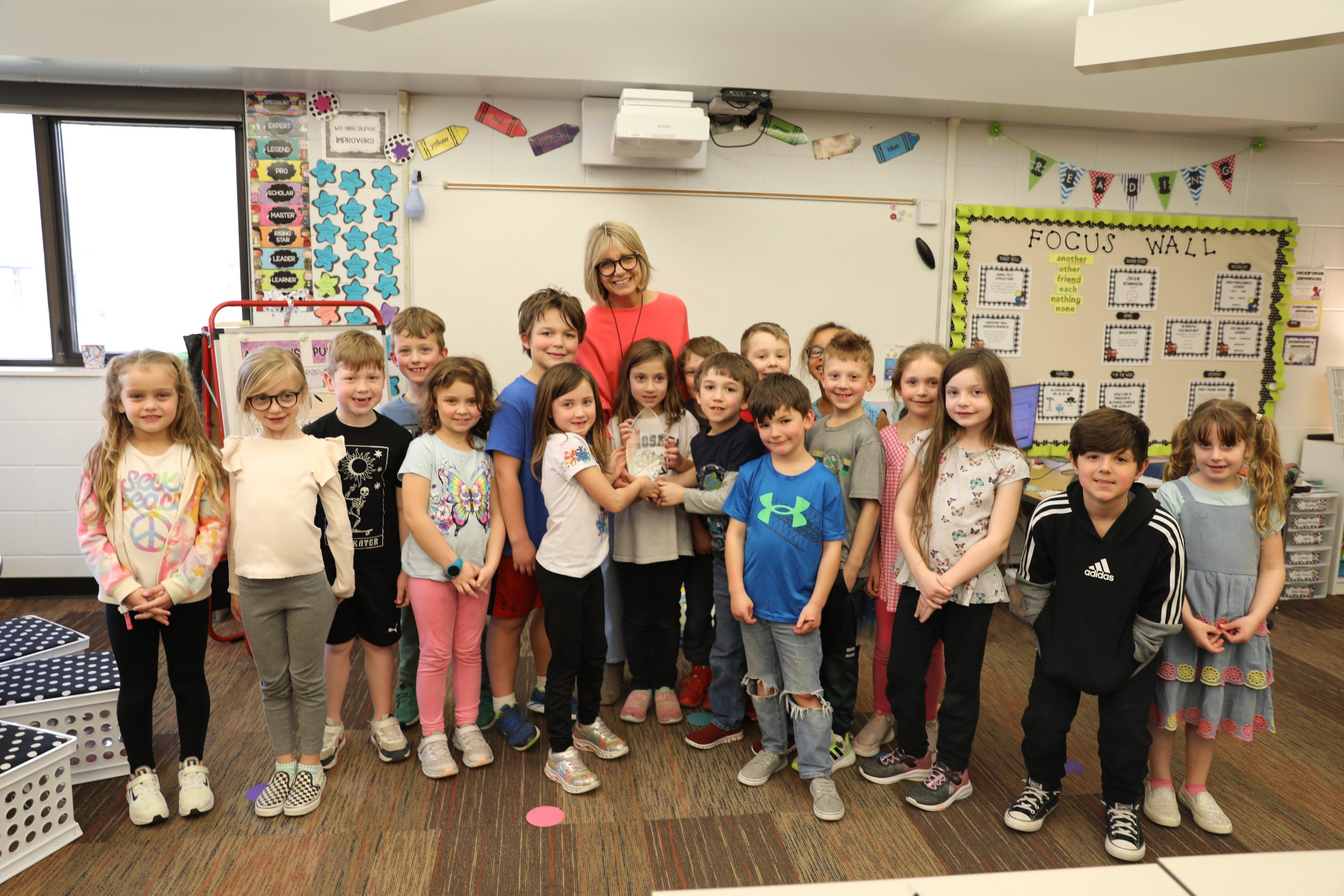 Mrs. Montgomery wins PHM Impact Award - Prairie Vista Elementary School